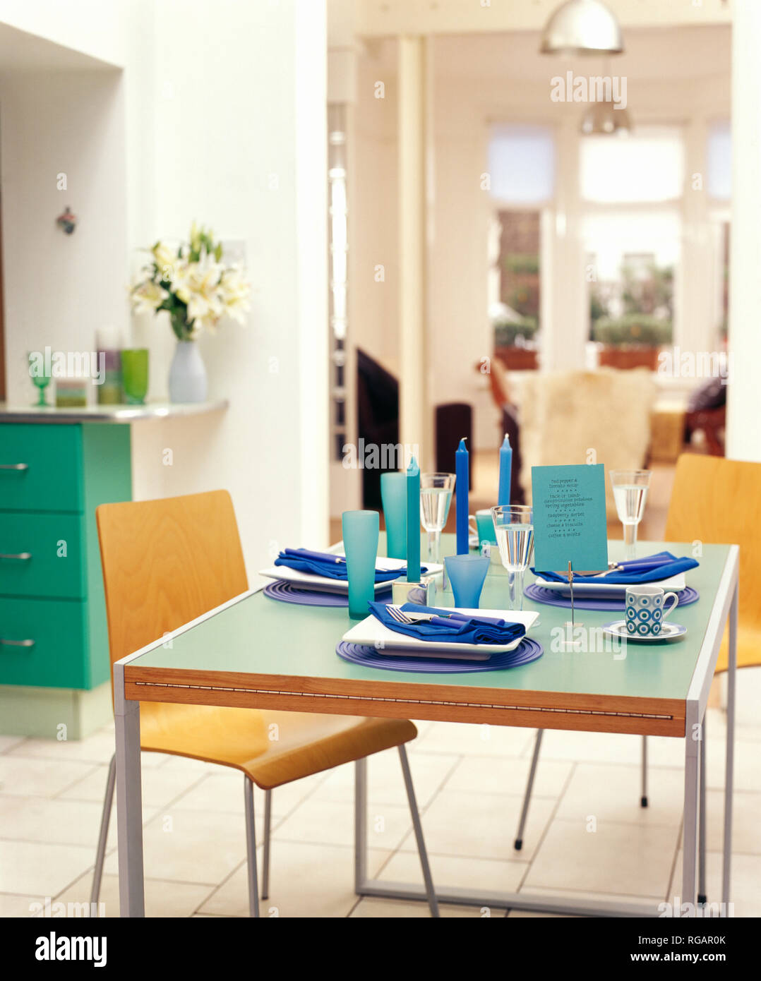 Simple dining chairs and table in modern economy style kitchen Stock ...