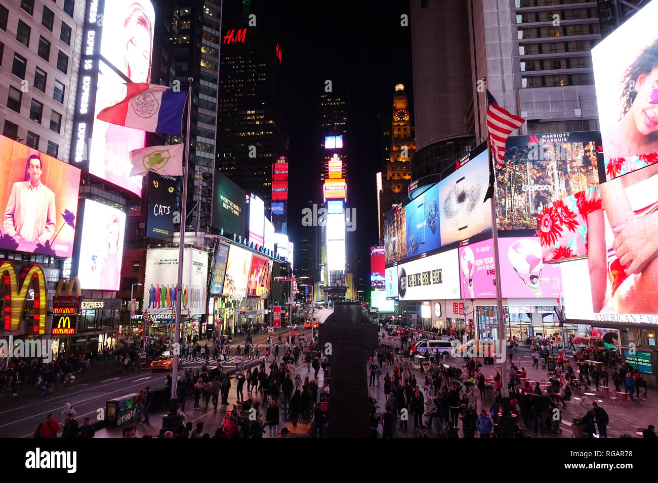 A view of the neon lights at Times Square, New York City at night Stock ...