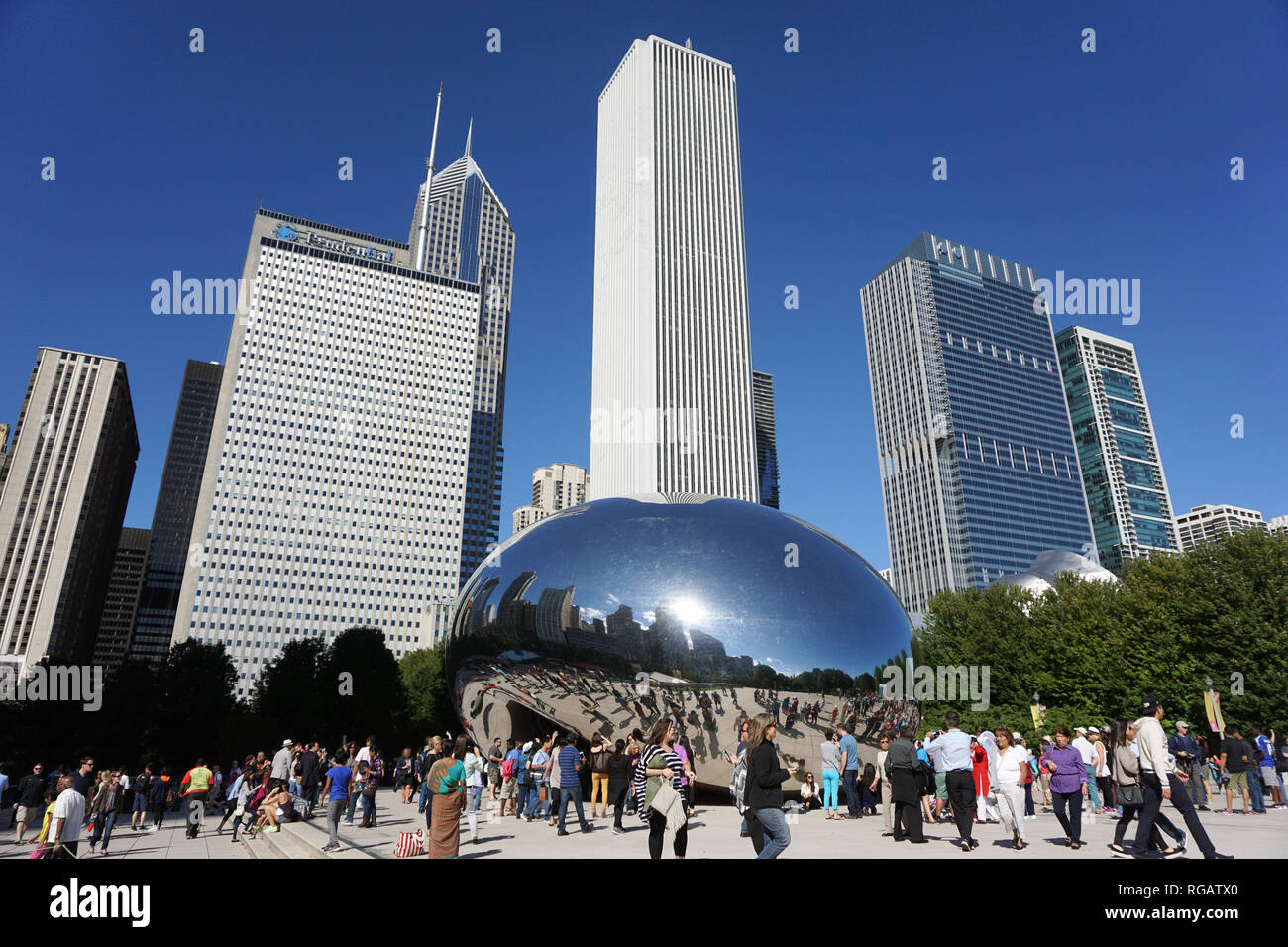A view of downtown Chicago reflected in the art installation “the bean ...