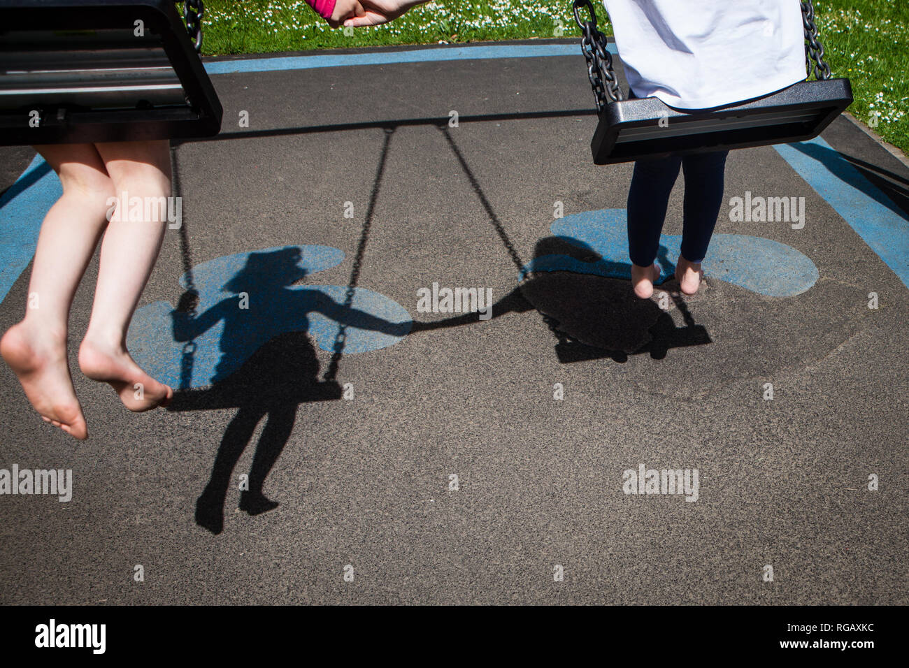 Two sisters and children and shadow hi-res stock photography and images ...