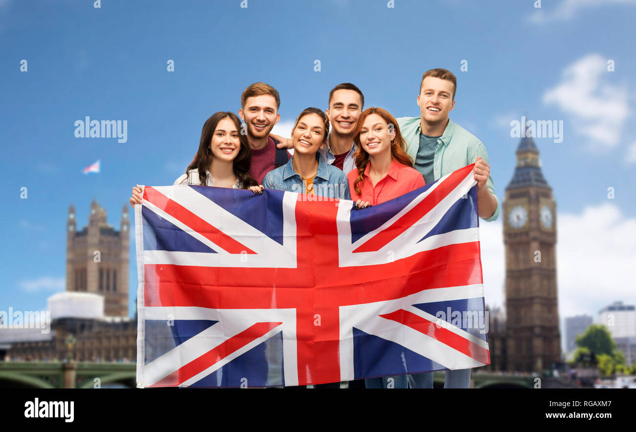 group of friends with british flag over big ben Stock Photo - Alamy