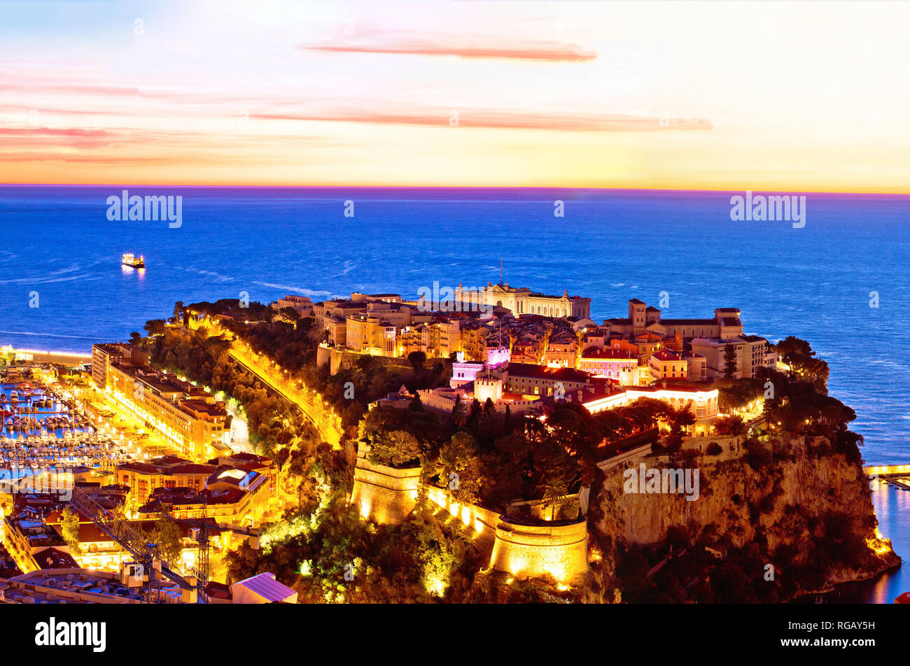 Old Monaco town on the rock colorful evening panoramic view from above ...