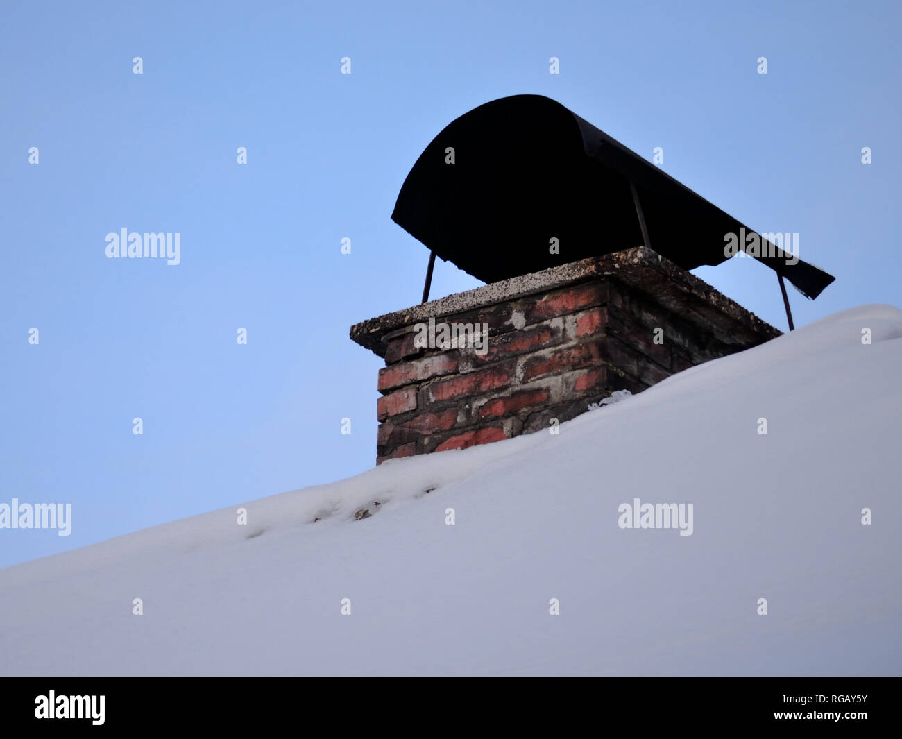 Old brick chimney on roof hi-res stock photography and images - Alamy