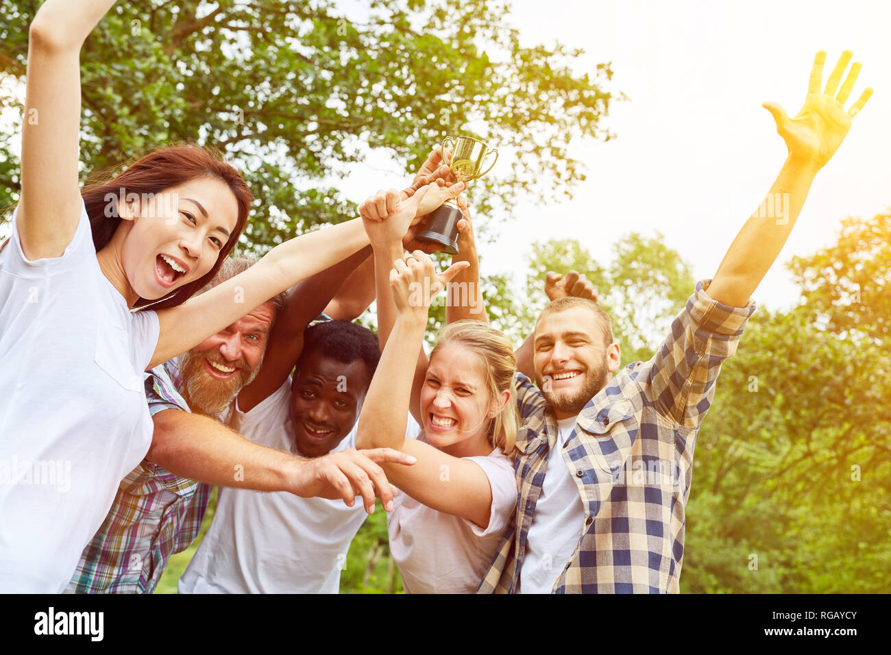Trophy after winning with his team the hi-res stock photography and ...