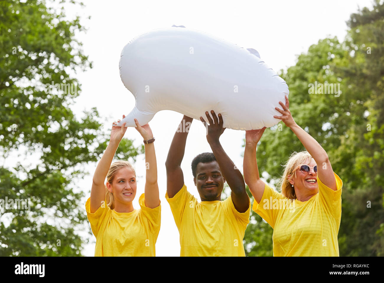 Team volunteer activists are advertising with a white balloon Stock ...