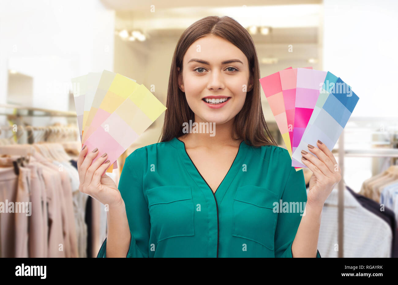 woman with color swatches at clothing store Stock Photo - Alamy