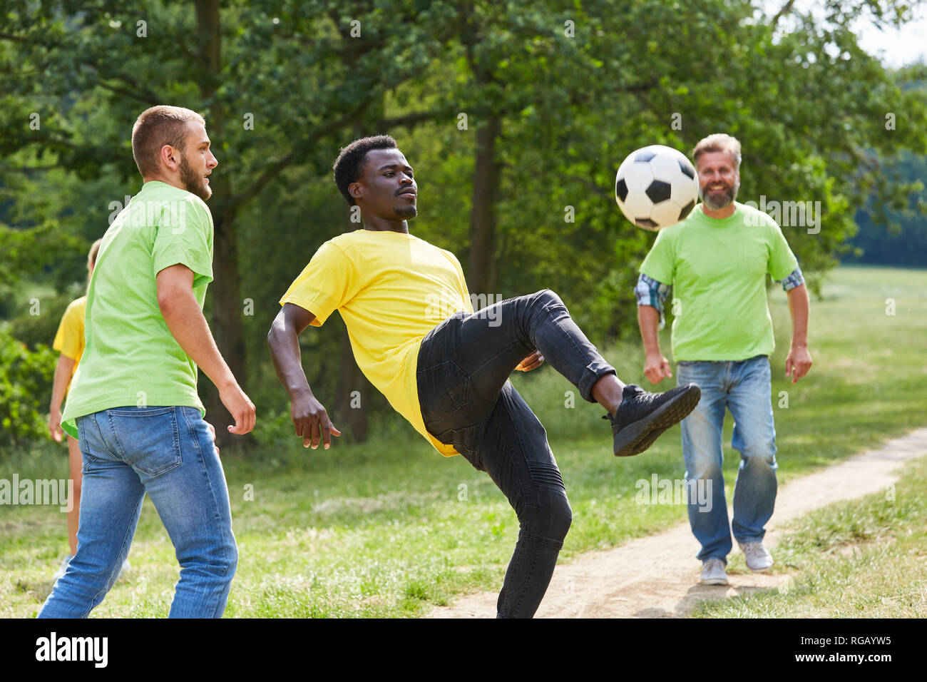 Football together hi-res stock photography and images - Alamy