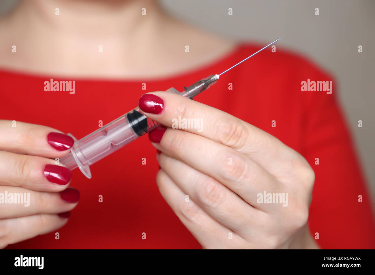 Hands female doctor applying red hi-res stock photography and images ...