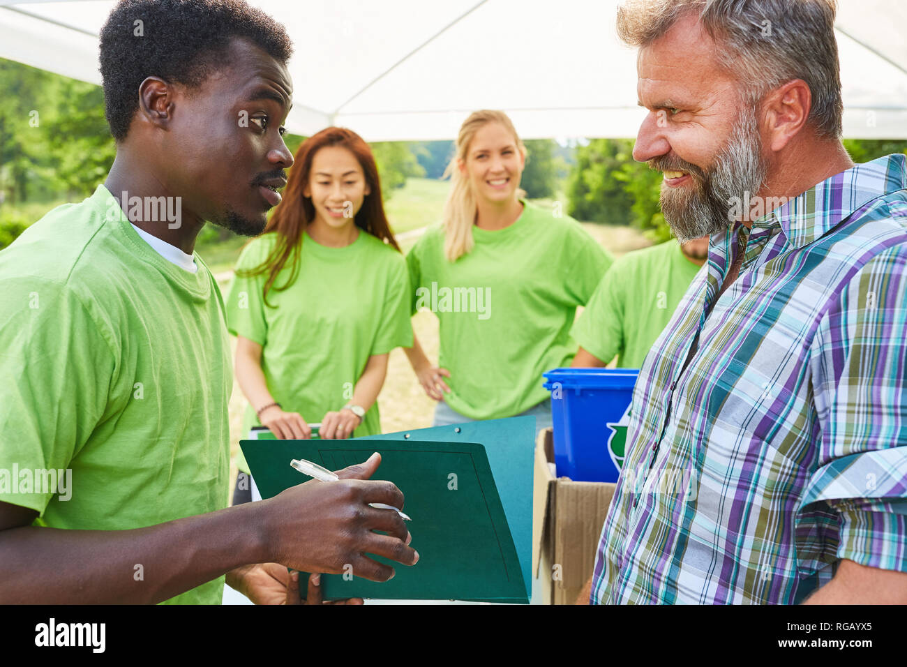 Team environmentalists advertise a conservation project for citizens ...