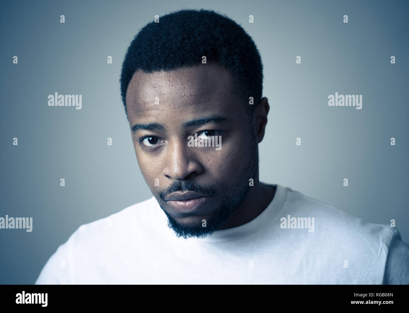 Portrait of african american adult in pain with sad and exhausted face ...