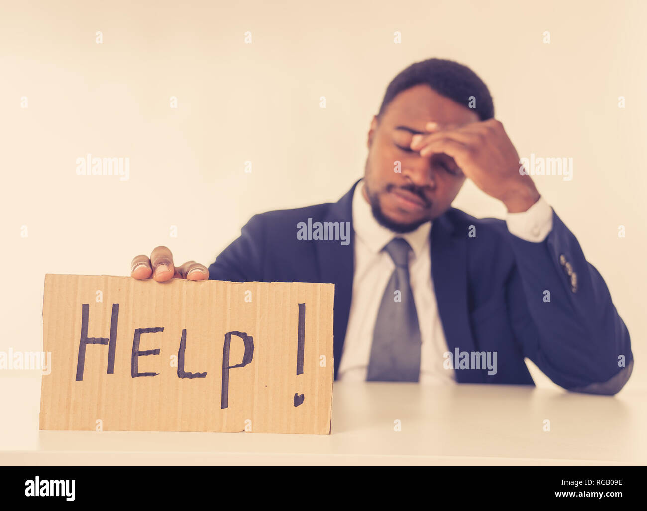 Young attractive and frustrated african american businessman holding ...