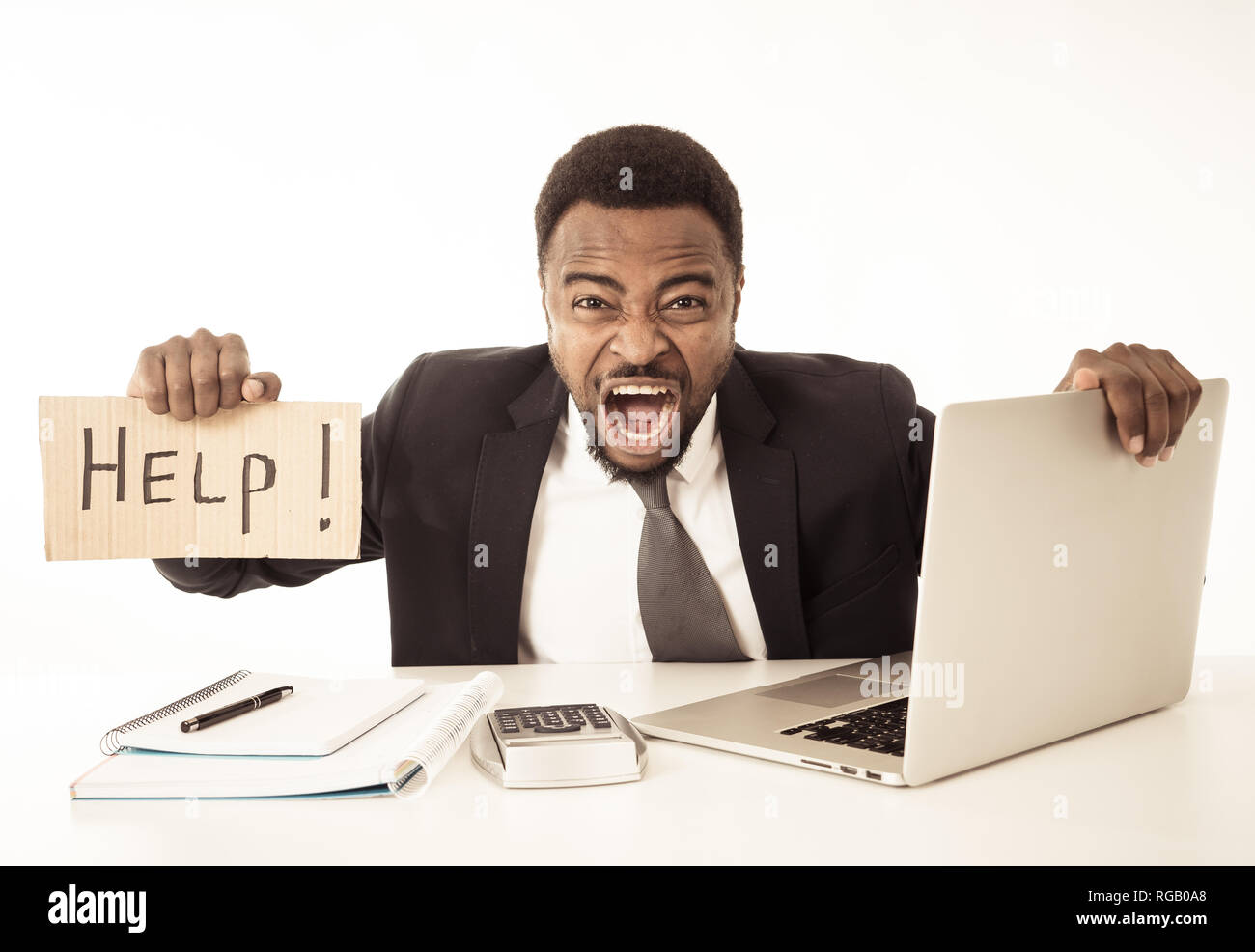 Desperate african american businessman with laptop computer suffering ...