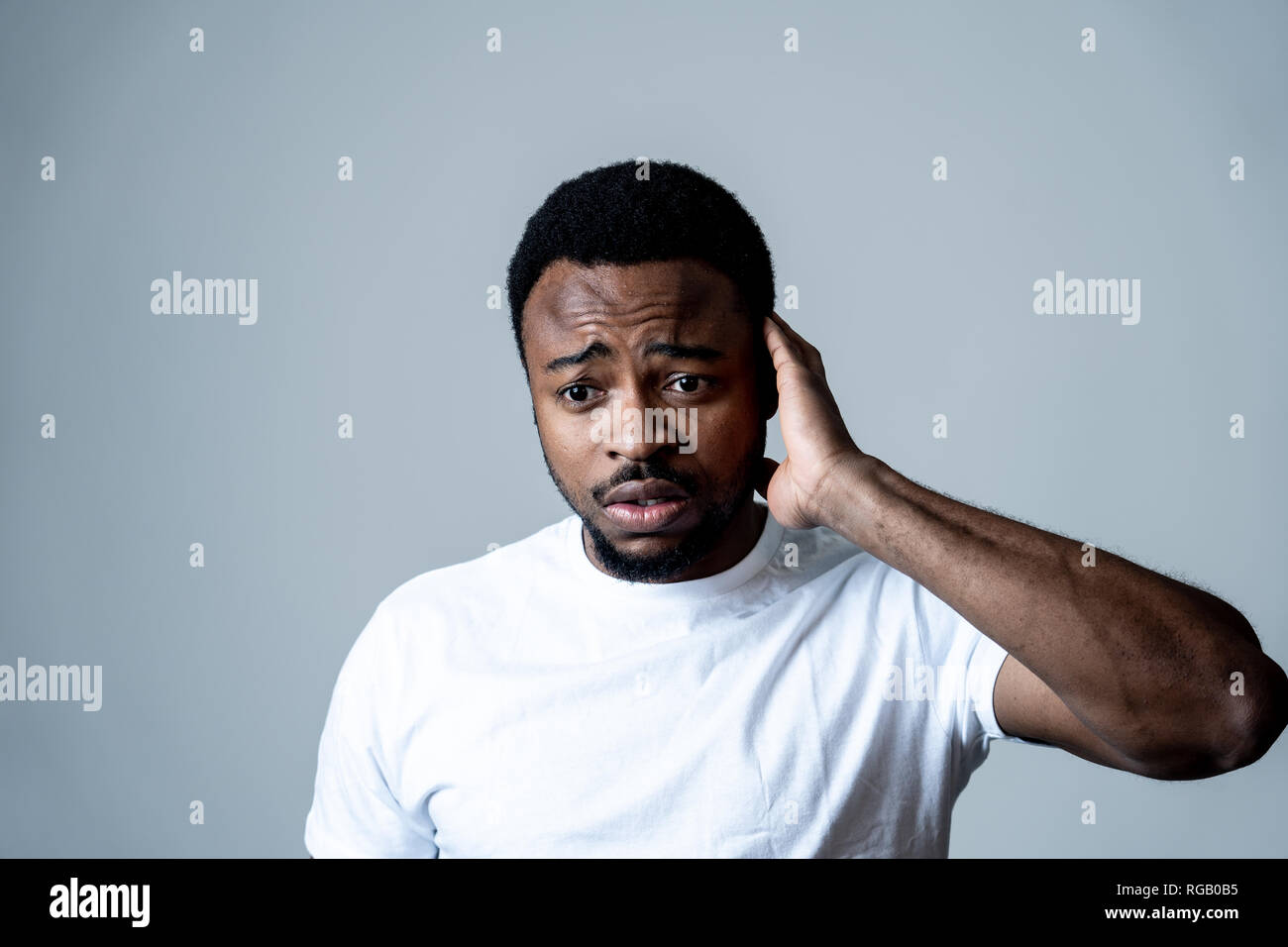 Portrait of attractive man sad and depressed suffering depression ...