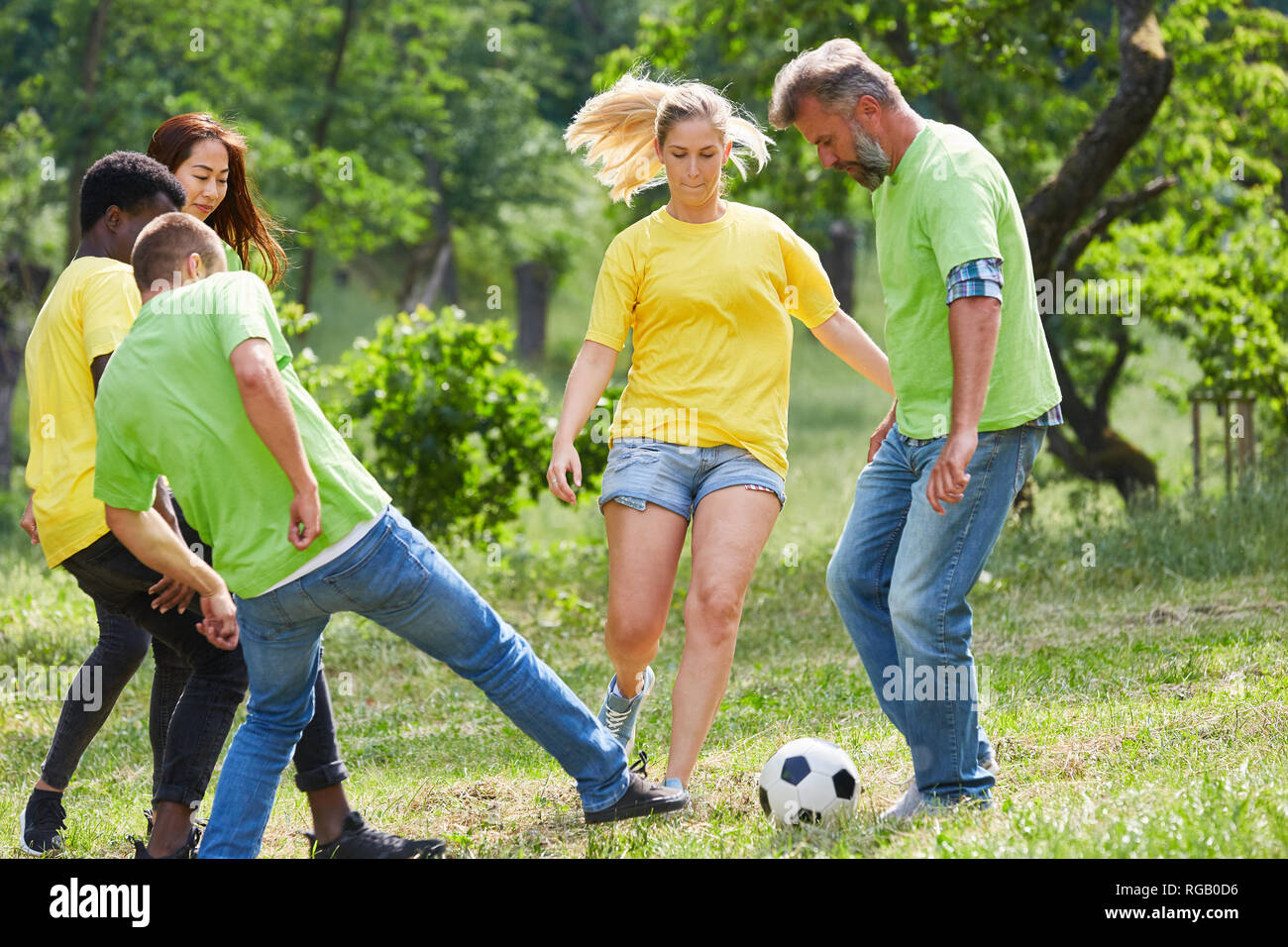 Young people on a football. Workshop for teambuilding and teambuilding ...