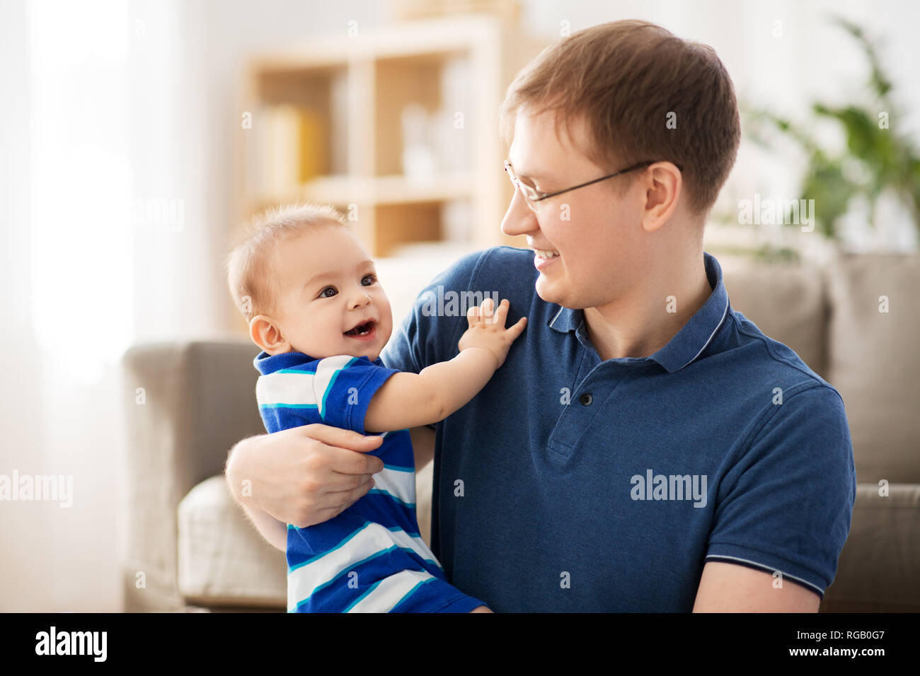 happy baby boy with father at home Stock Photo - Alamy