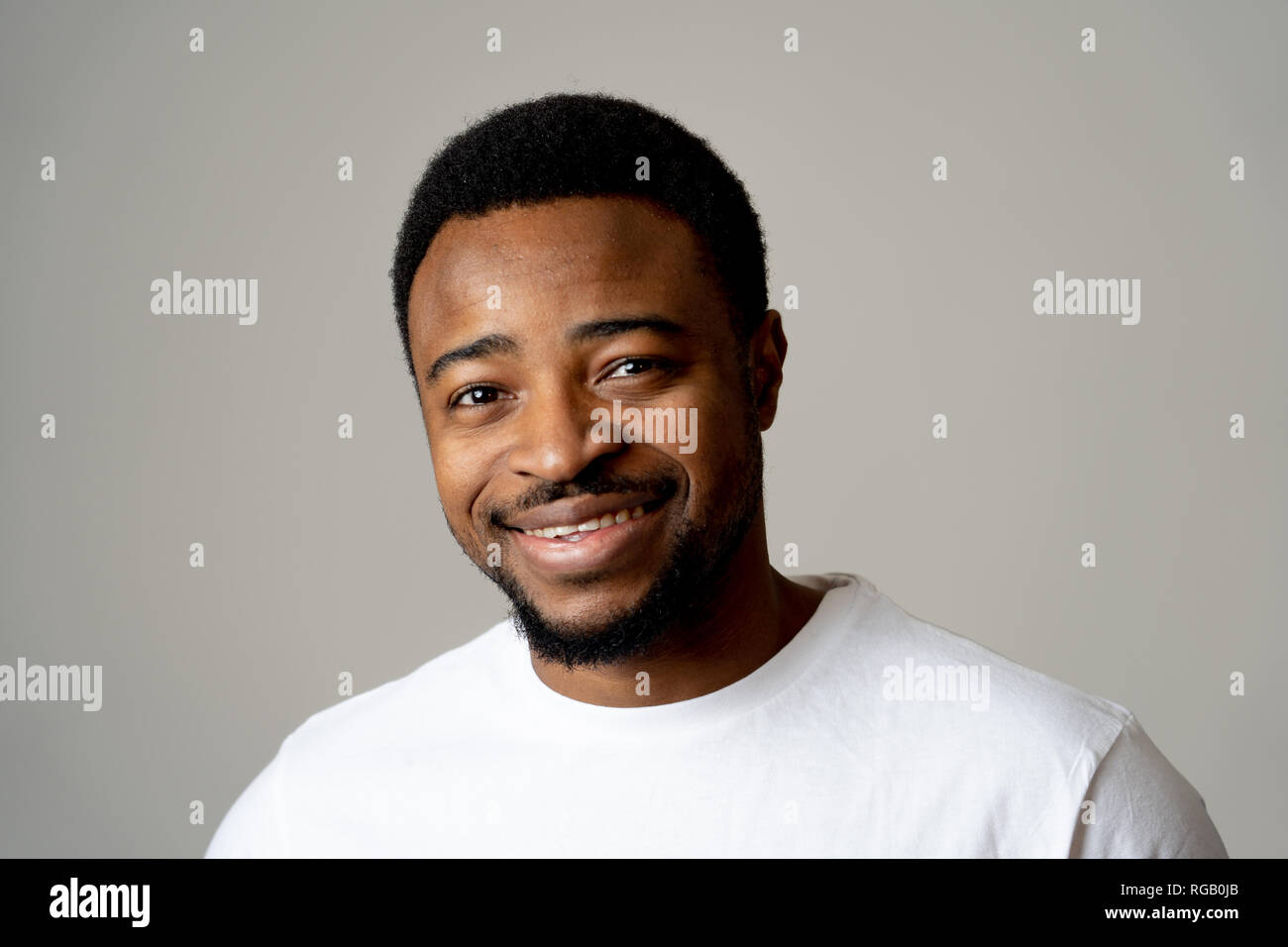 Portrait of smiling man having fun and joy smiling and laughing at the ...