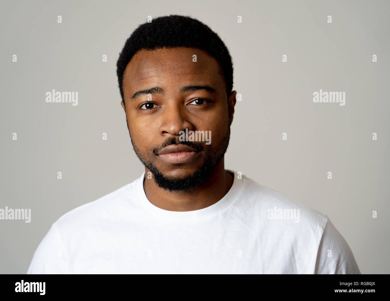 Portrait of attractive, confident african american young man looking ...