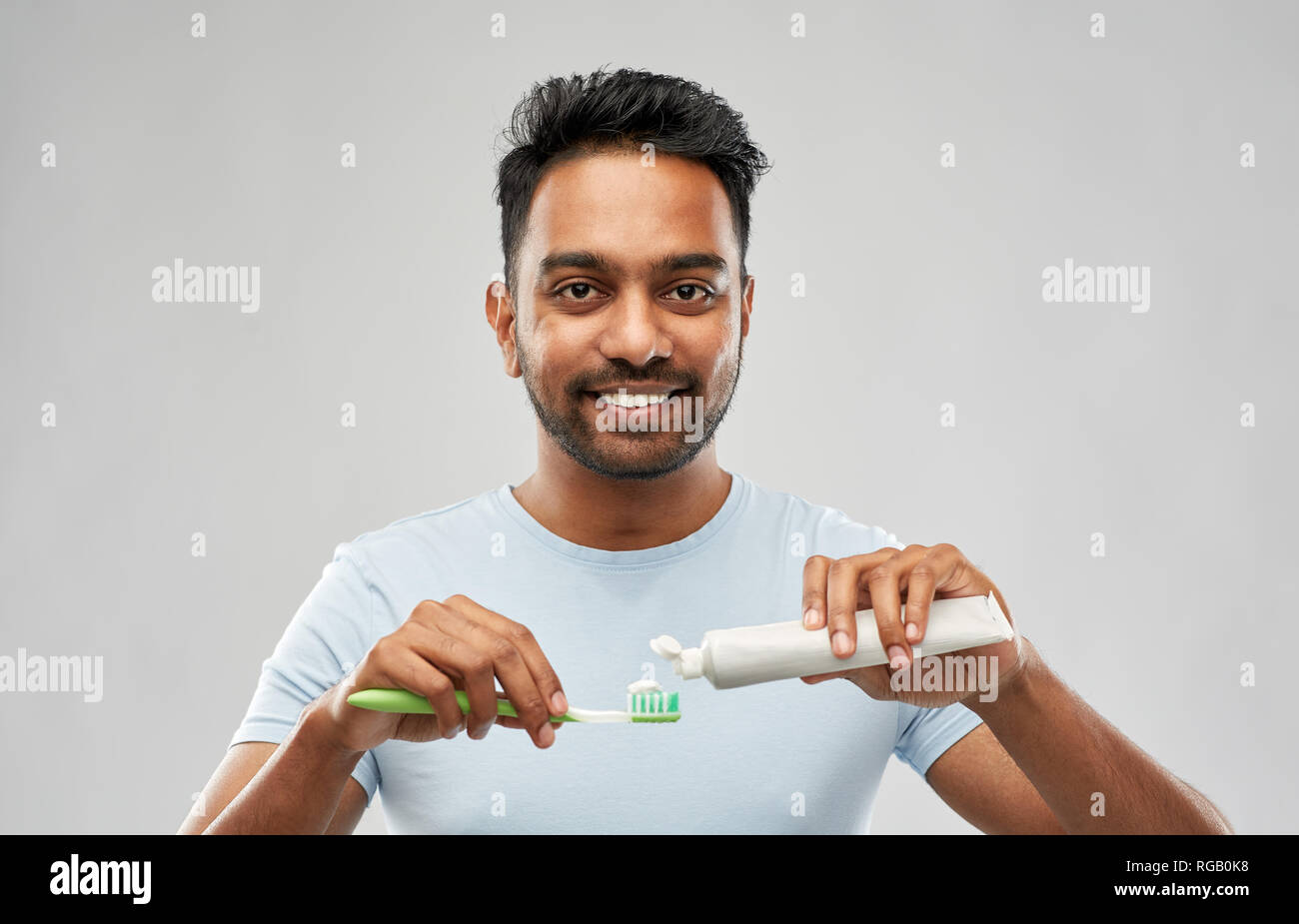 indian man with toothbrush and toothpaste Stock Photo - Alamy