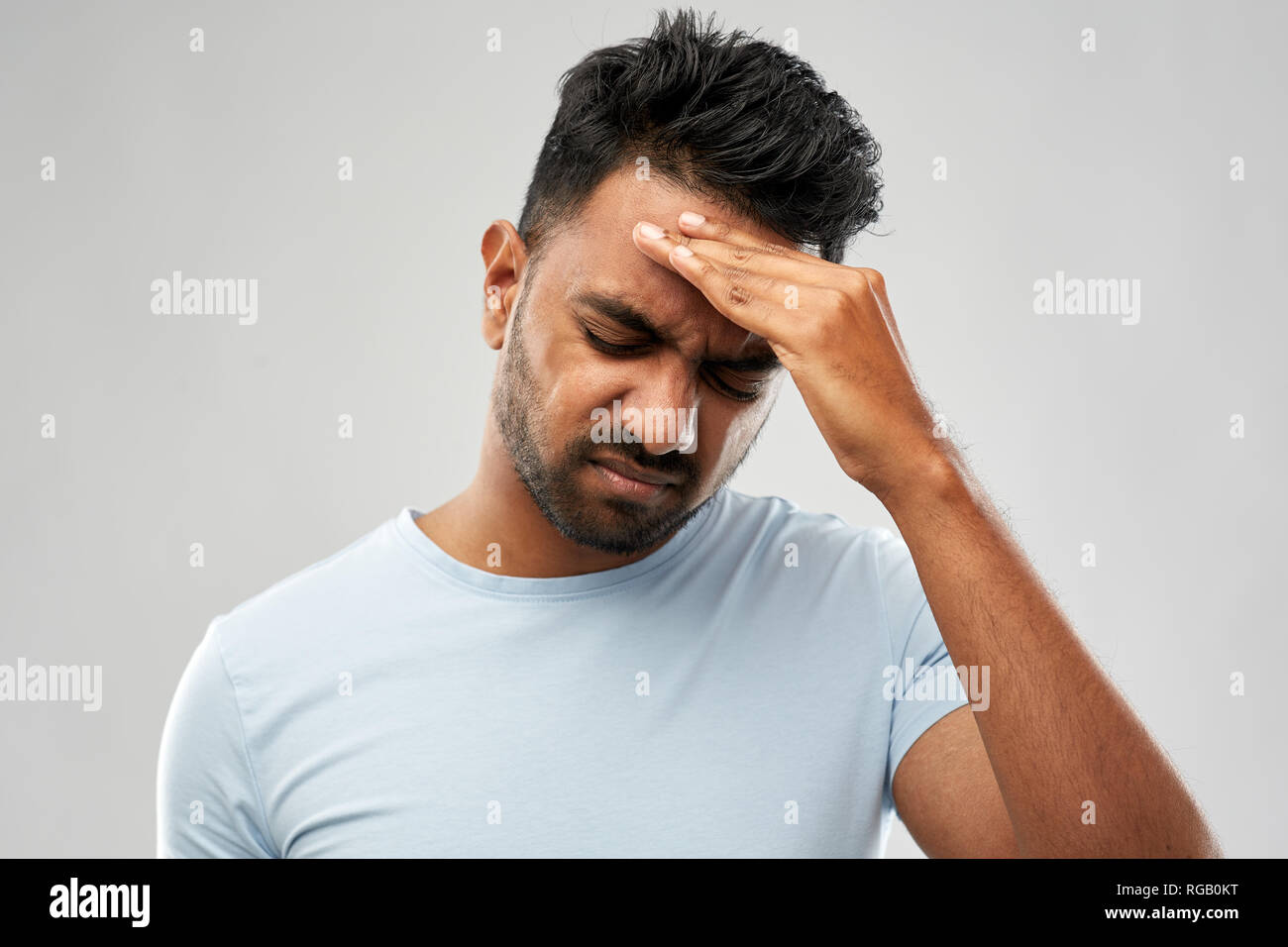 Indian man headache hi-res stock photography and images - Alamy
