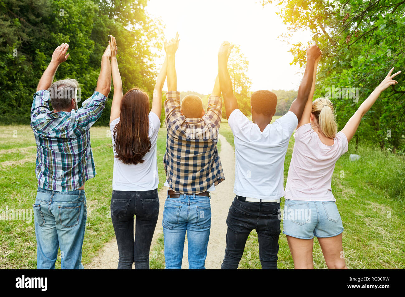 Hands raise cheering hi-res stock photography and images - Alamy
