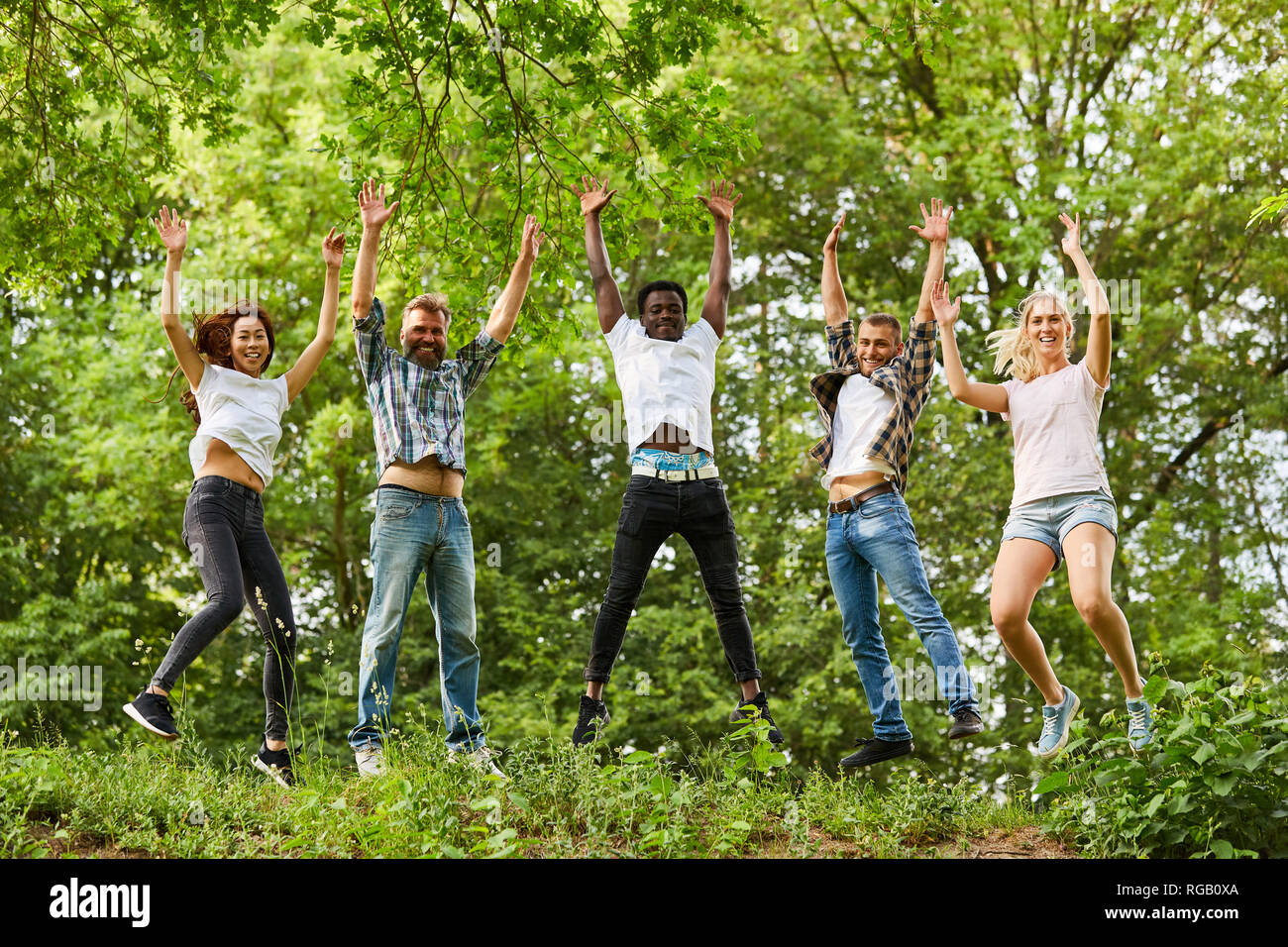 Team jumping hi-res stock photography and images - Alamy