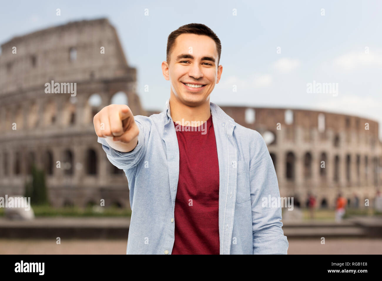 man pointing to you over coliseum background Stock Photo - Alamy