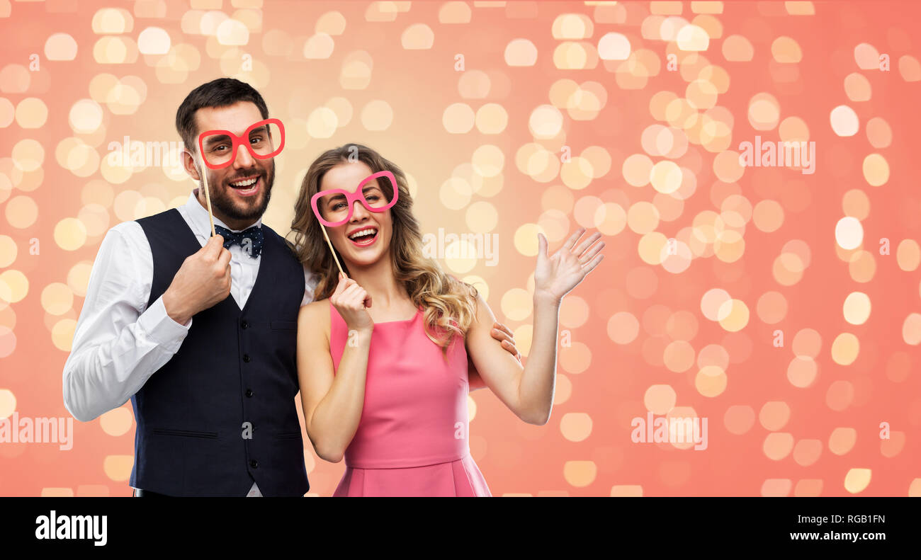 couple with party props having fun and posing Stock Photo - Alamy