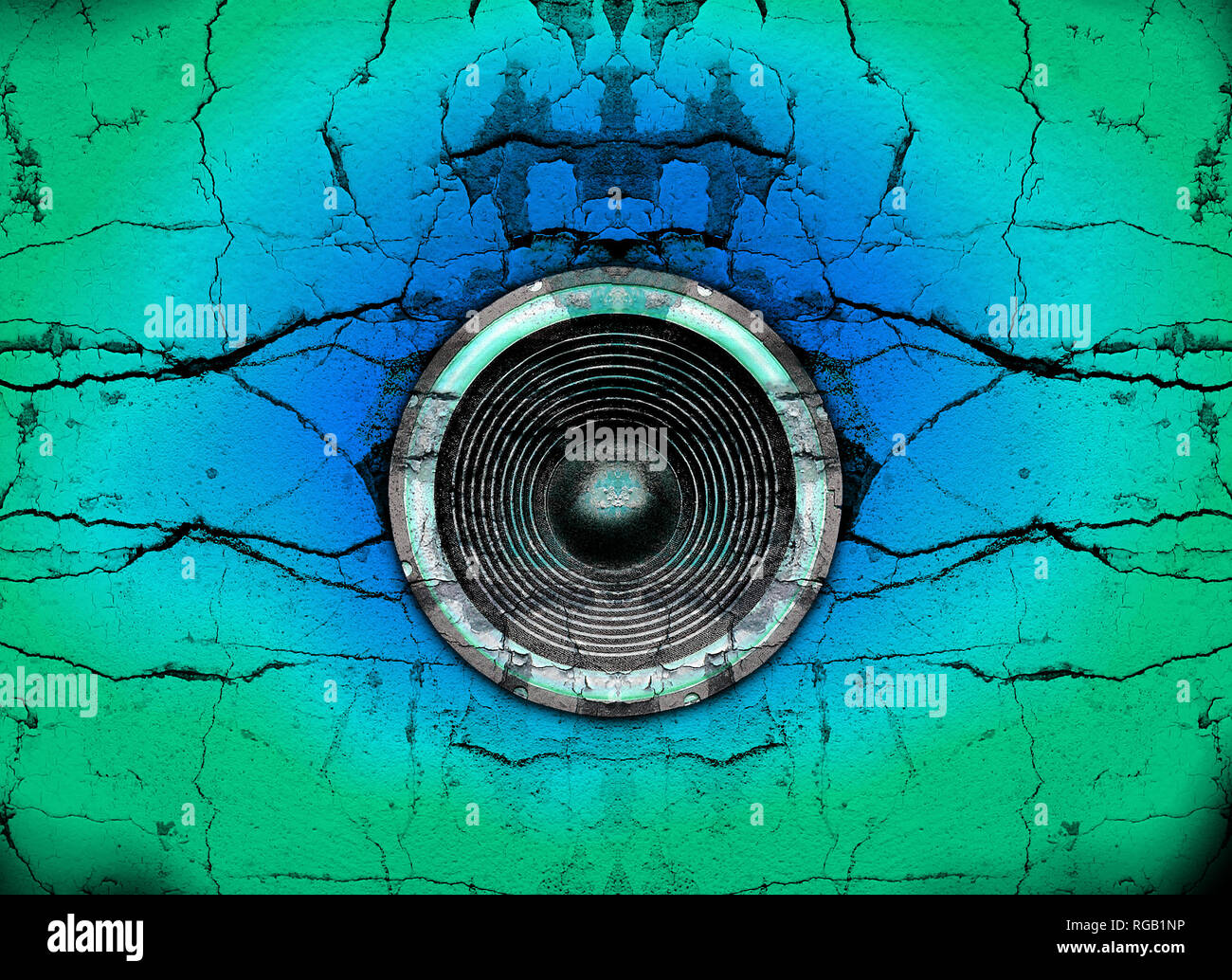 Blue and green audio speaker on a cracked wall background Stock Photo ...