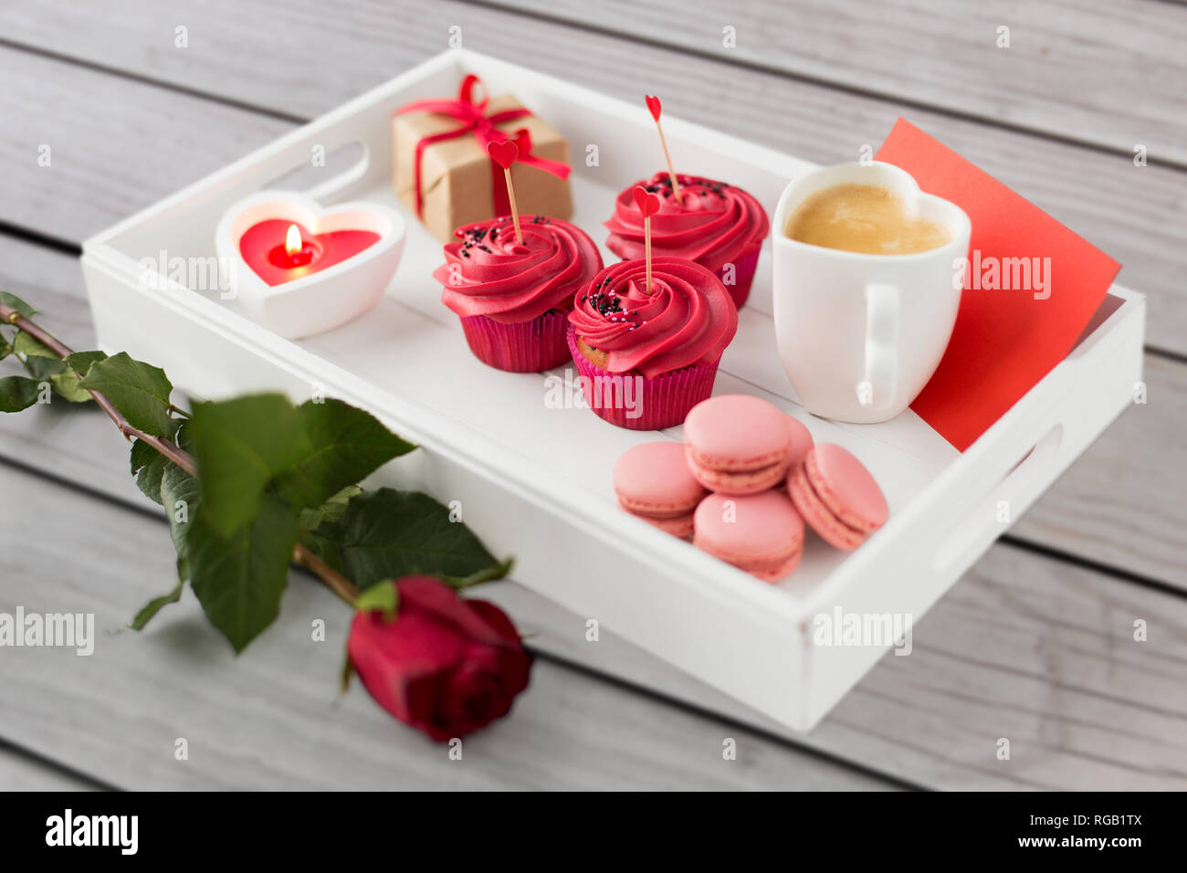 Sweets decorated with rose hi-res stock photography and images - Alamy