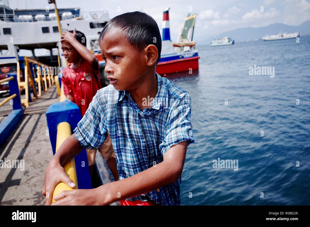 Portrait of Indonesian boy playing Stock Photo - Alamy