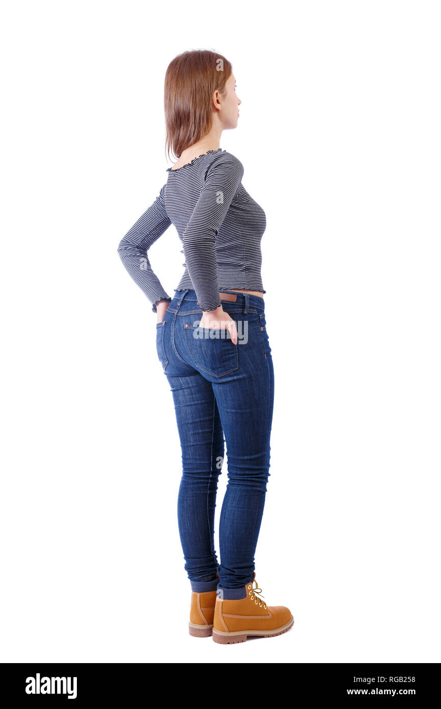 Side view of a woman in striped T-shirt. girl watching. Rear view ...