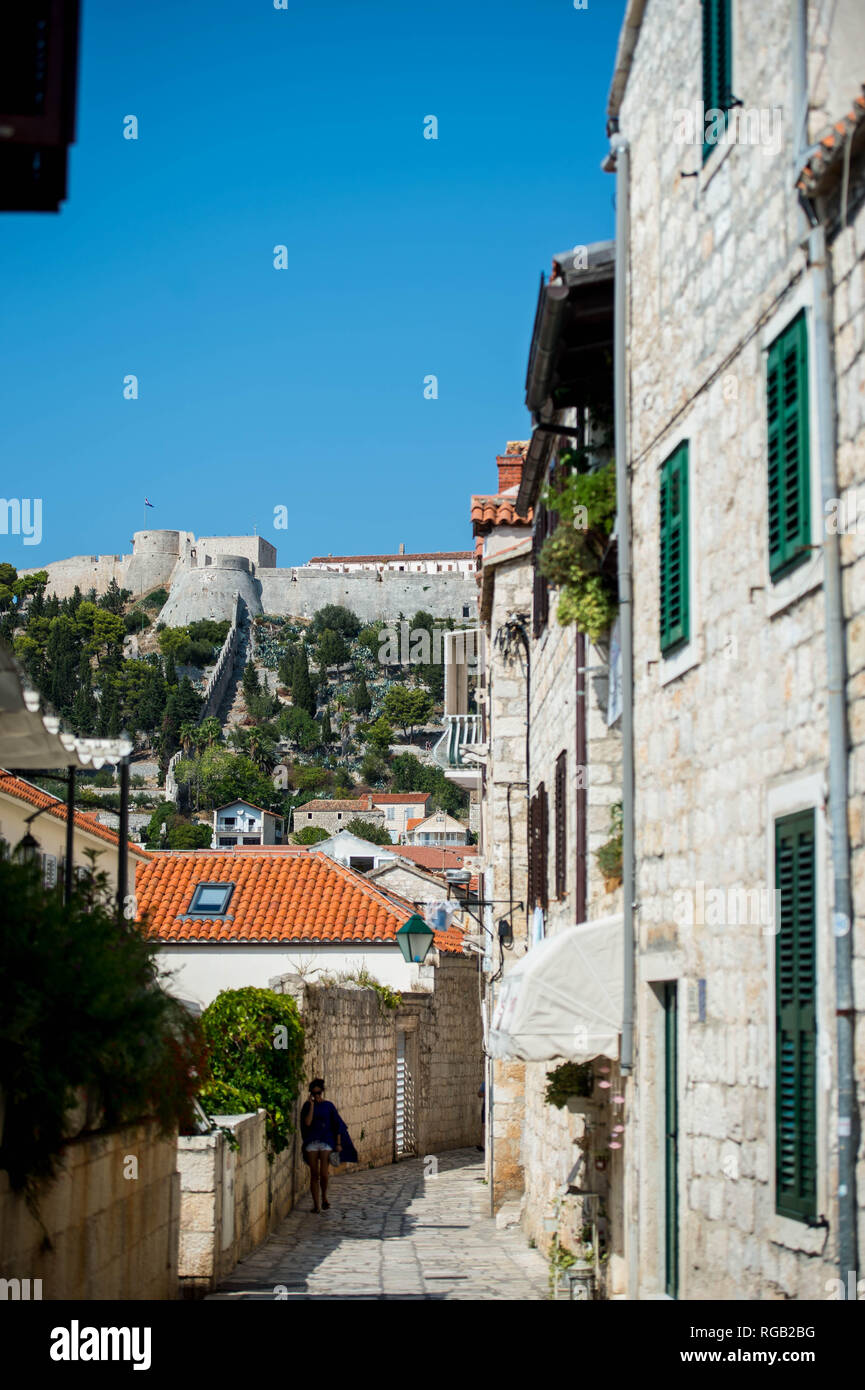 Friday 31 August 2018 Pictured: Narrow street with Hvar Fortress in the ...