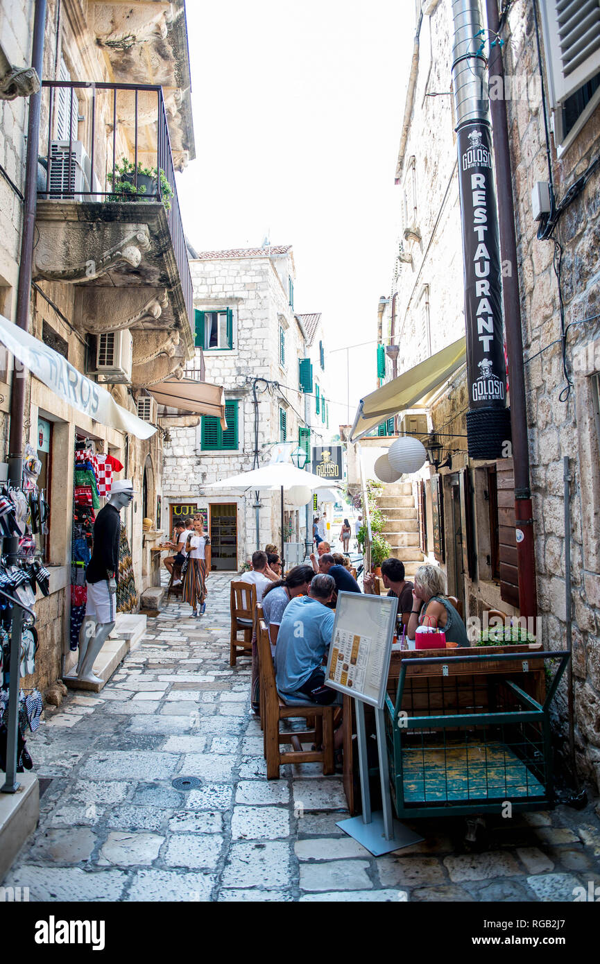 Friday 31 August 2018 Pictured: Narrow Street in Hvar with people ...