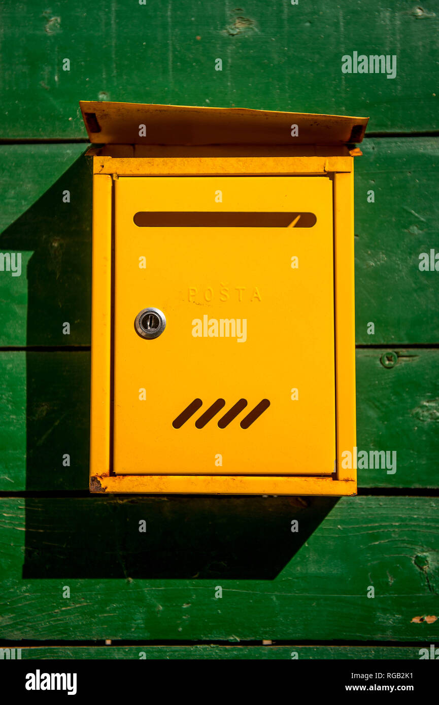 Friday 31 August 2018 Pictured: Yellow post box on a green wall Re ...