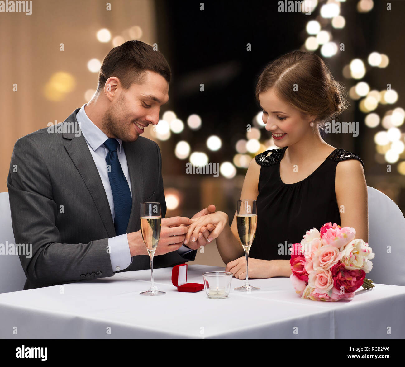 Man woman sparkling lights hi-res stock photography and images - Alamy