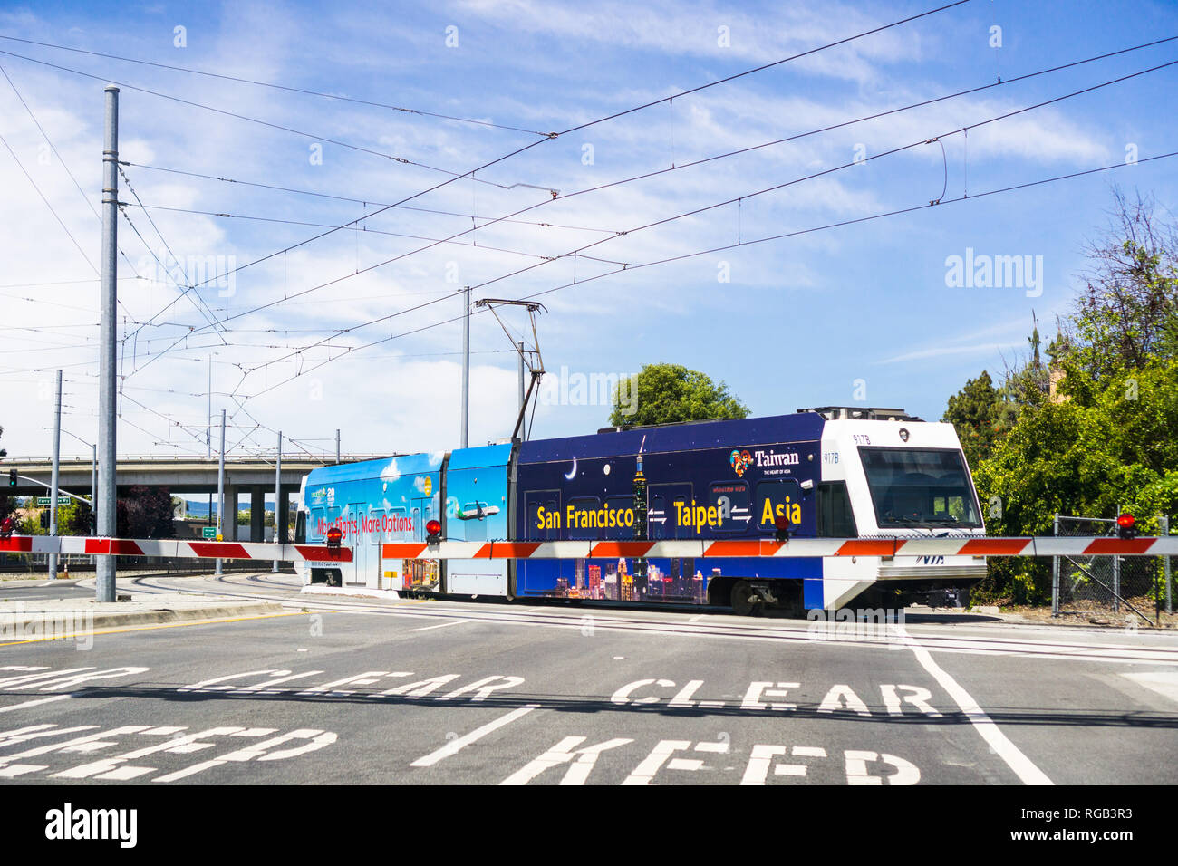 May 6, 2018 Mountain View / CA / USA - Waiting at a barrier for a VTA ...
