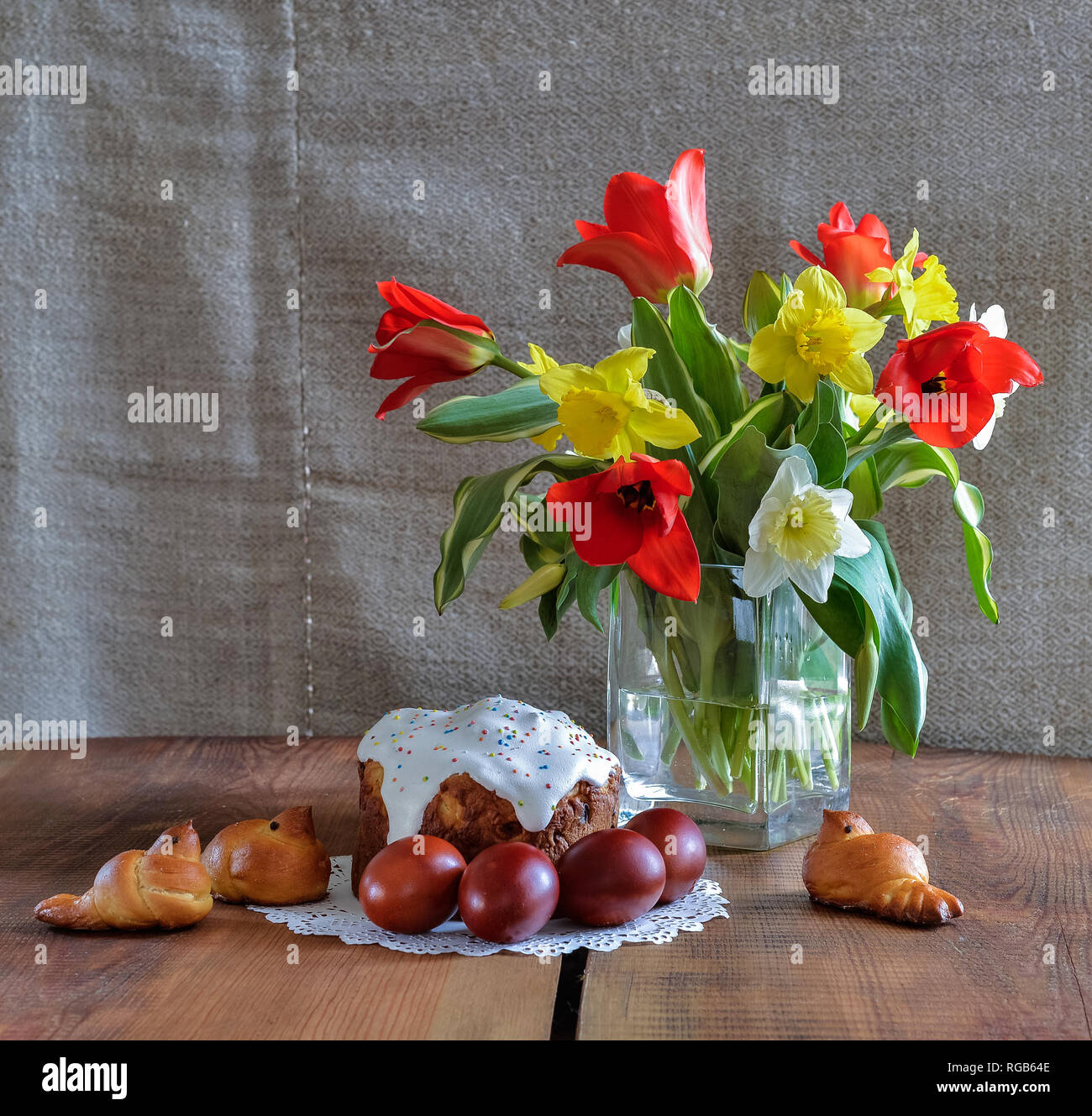 Easter ritual food and spring flowers Stock Photo - Alamy