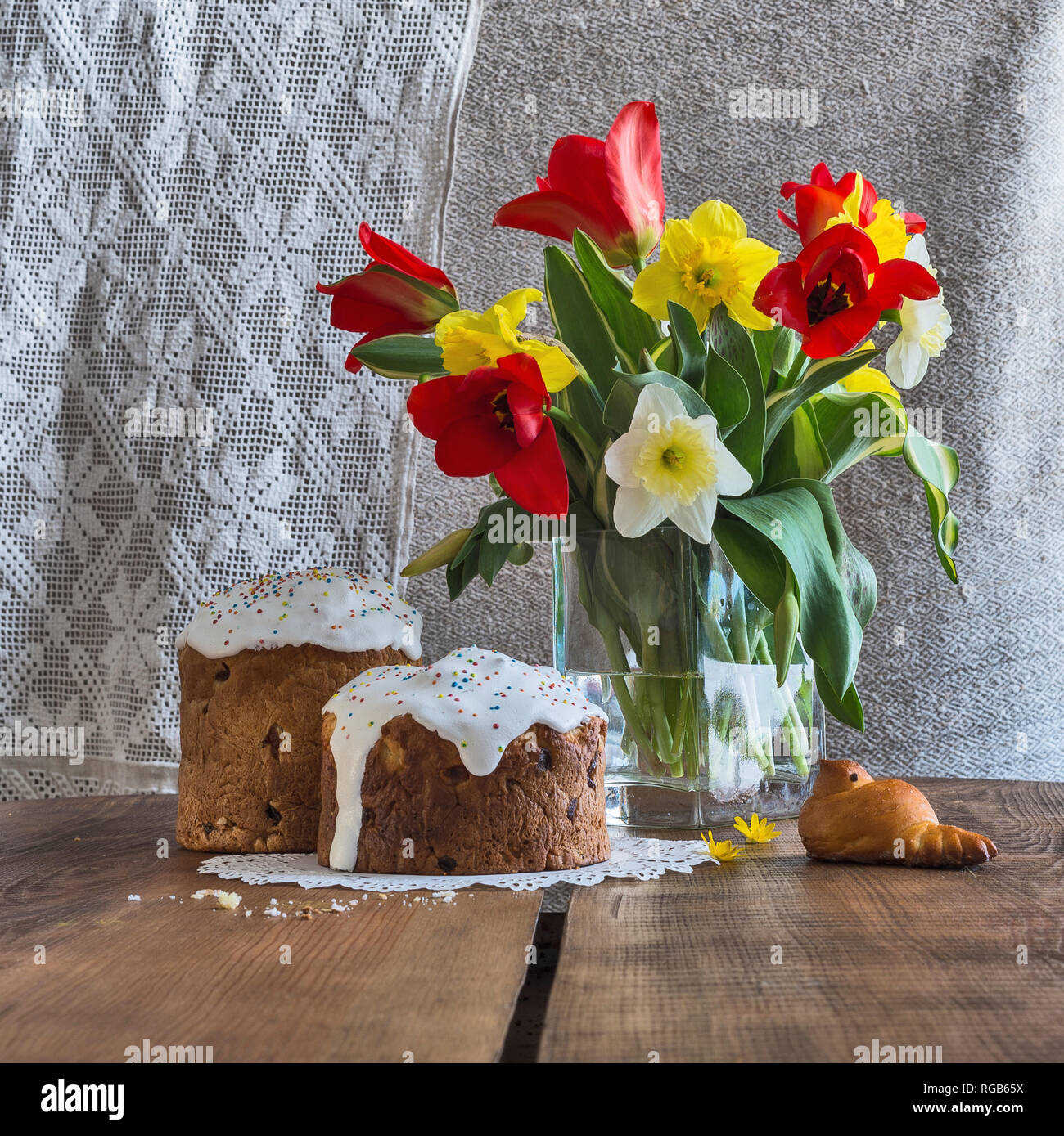 Easter ritual food and spring flowers Stock Photo - Alamy