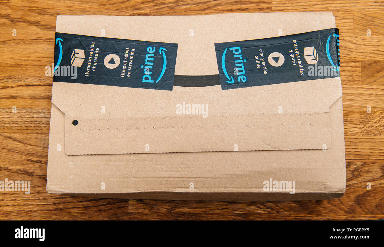 PARIS, FRANCE - JUL 12, 2018: Amazon Prime cardboard parcel box with ...