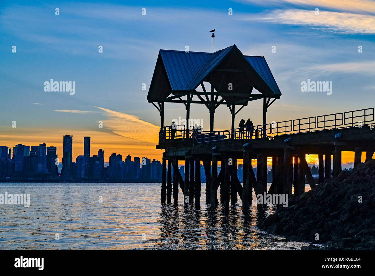 Pier at sunset with downtown Vancouver skyline, Waterfront Park, North ...