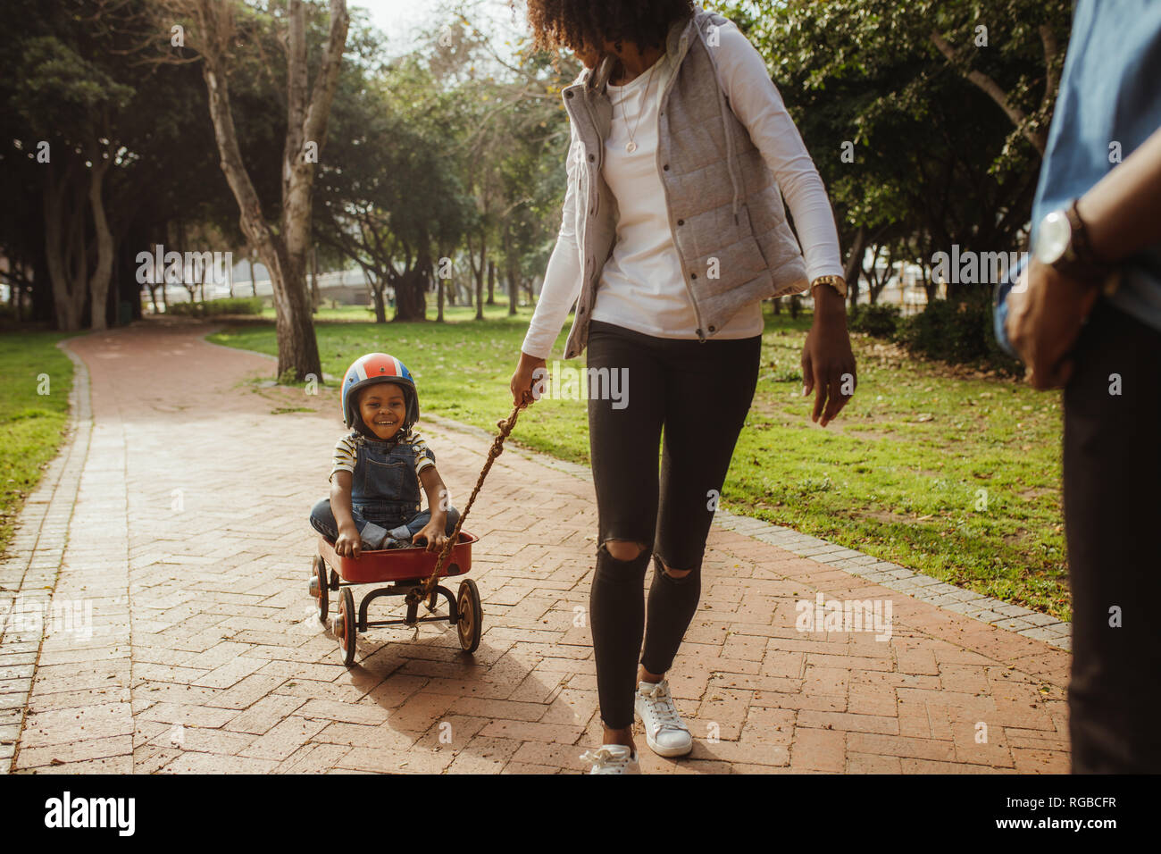 Boy pulling wagon hi-res stock photography and images - Alamy