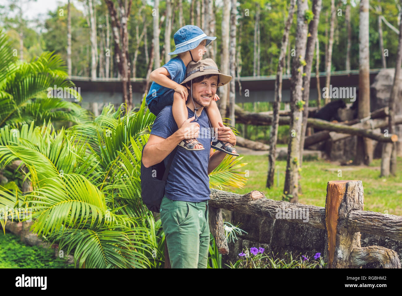 Father and son at the zoo. Spending day with family at the zoo Stock ...