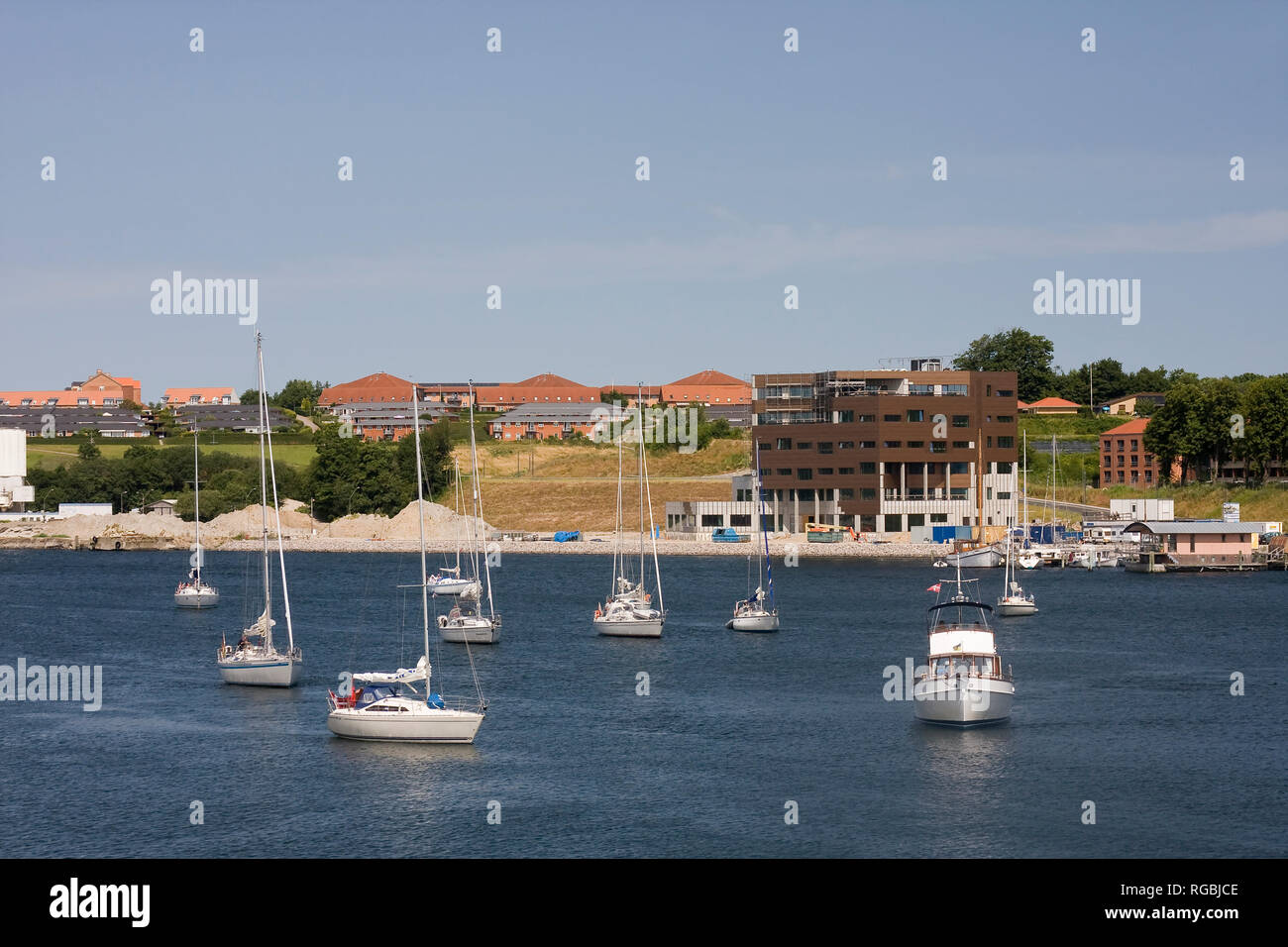Boats at the harbour entrance to the port of Sonderburg, Jutland ...