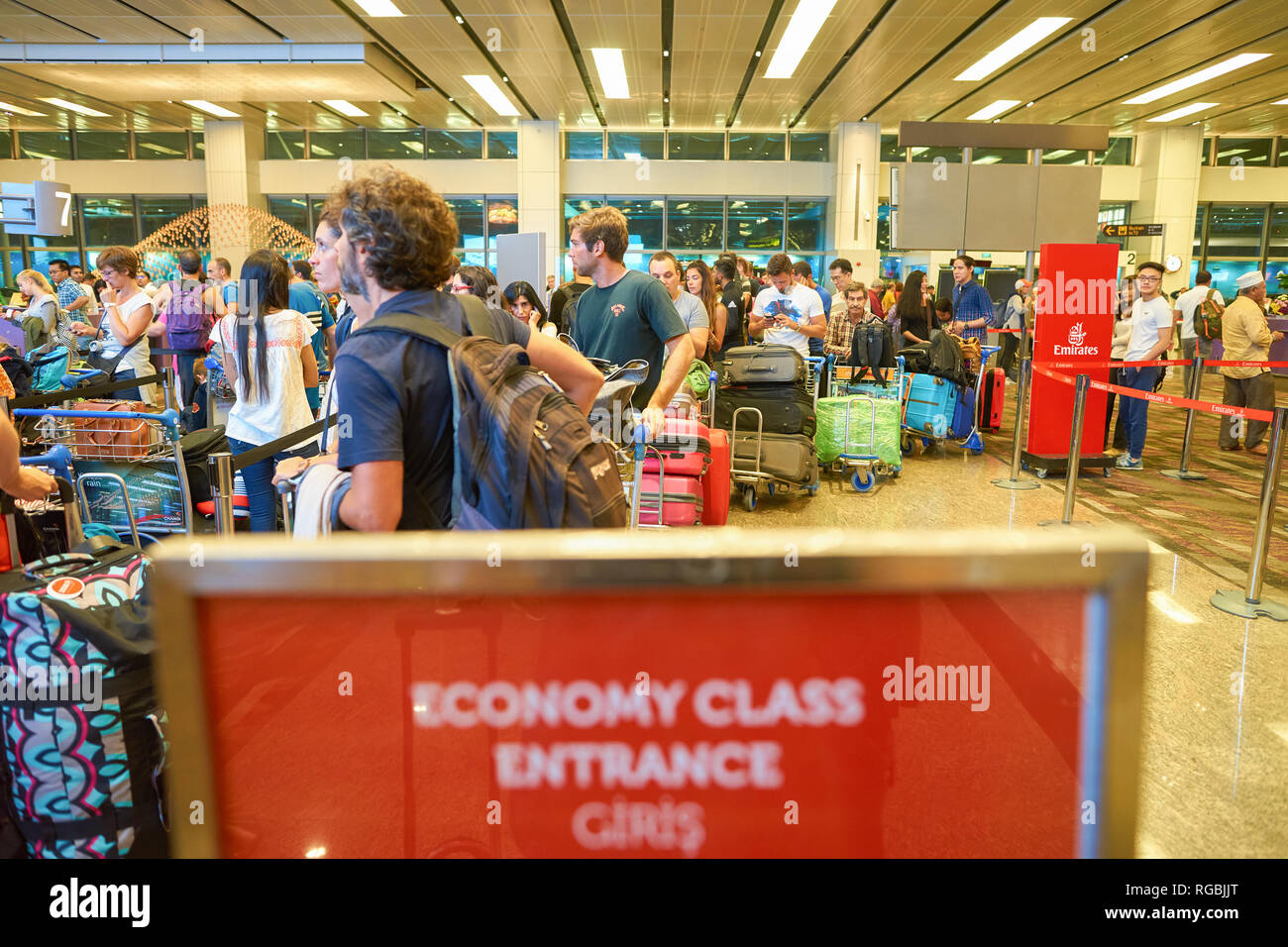 SINGAPORE - CIRCA AUGUST, 2016: close up shot of Economy class sign at ...