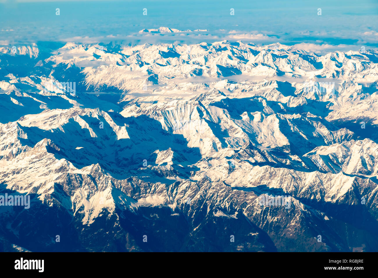 Swiss, Italy and Austrian Alps with snowy mountain tops aerial view ...