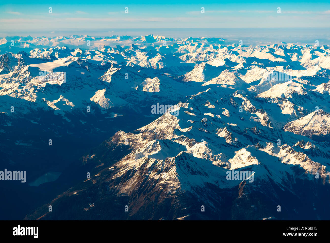 Swiss, Italy and Austrian Alps with snowy mountain tops aerial view ...