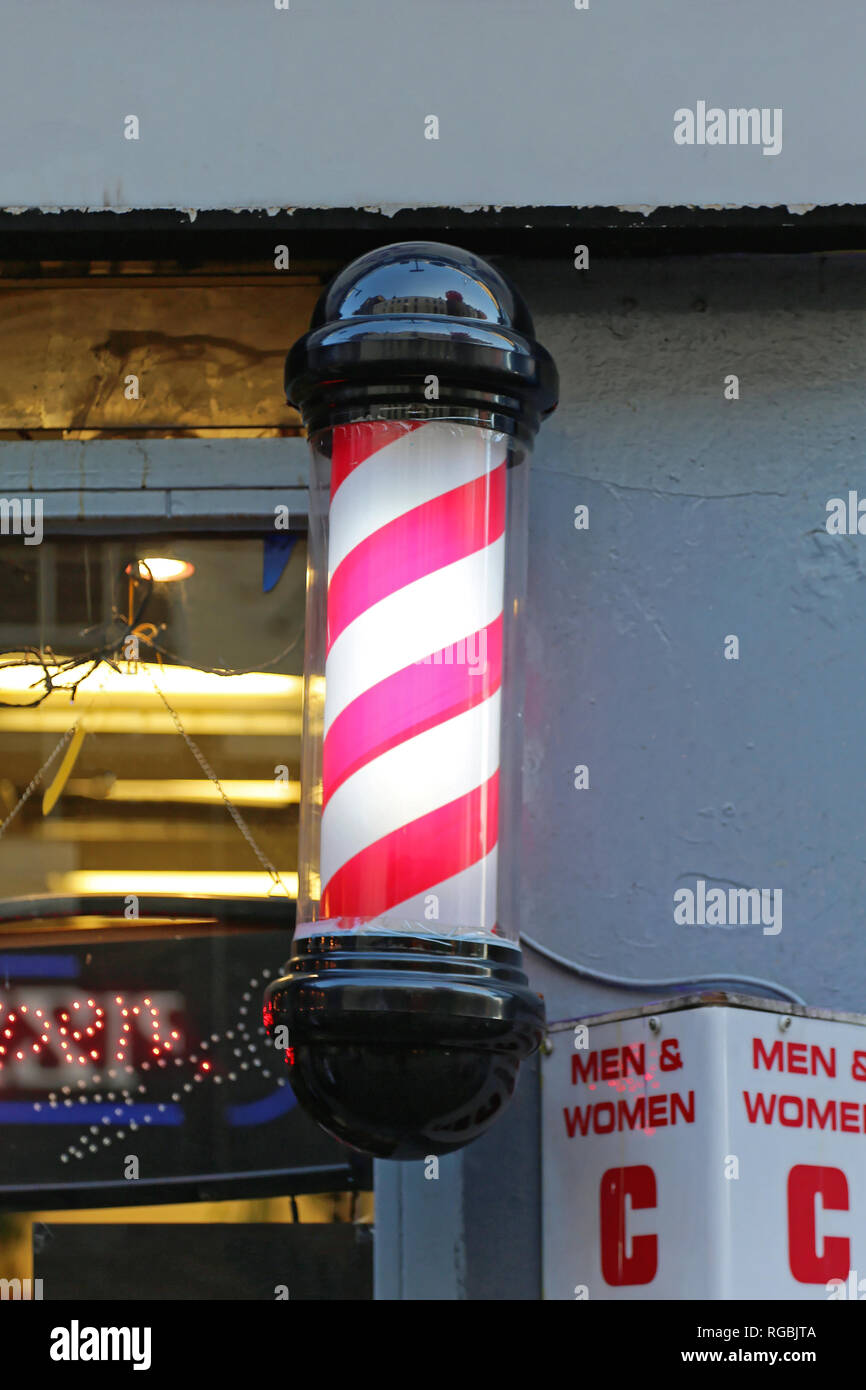 Barber Pole Turning Swirl Light Sign Stock Photo - Alamy