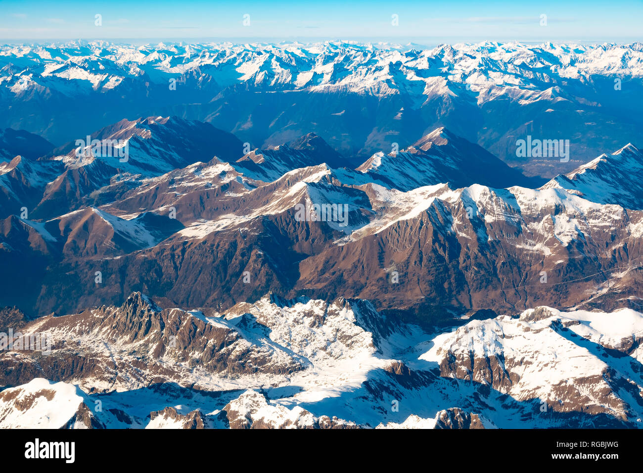 Swiss, Italy and Austrian Alps with snowy mountain tops aerial view ...