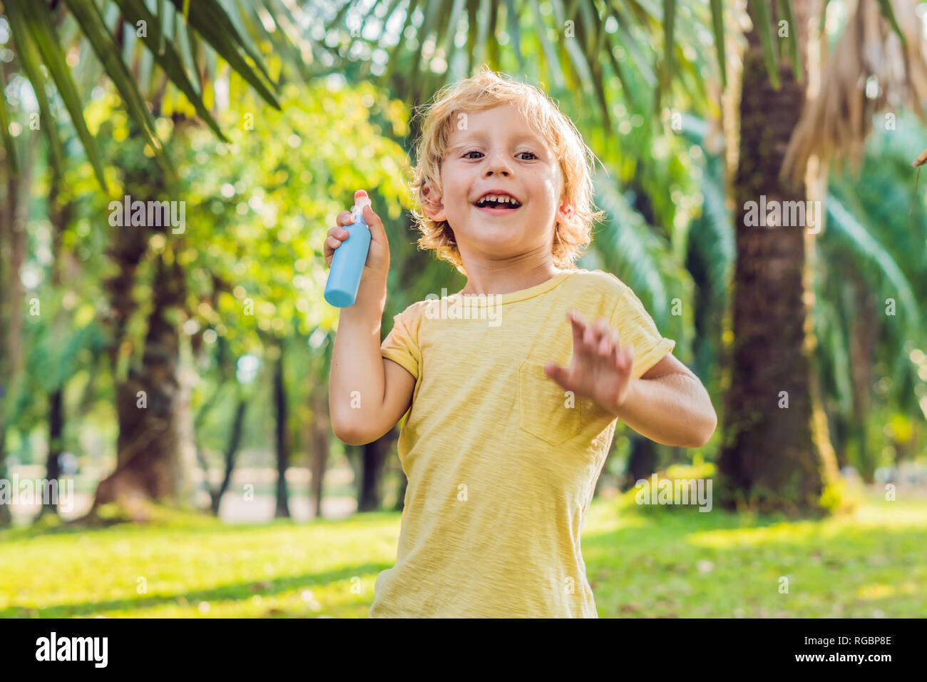 Child insect spray hi-res stock photography and images - Alamy