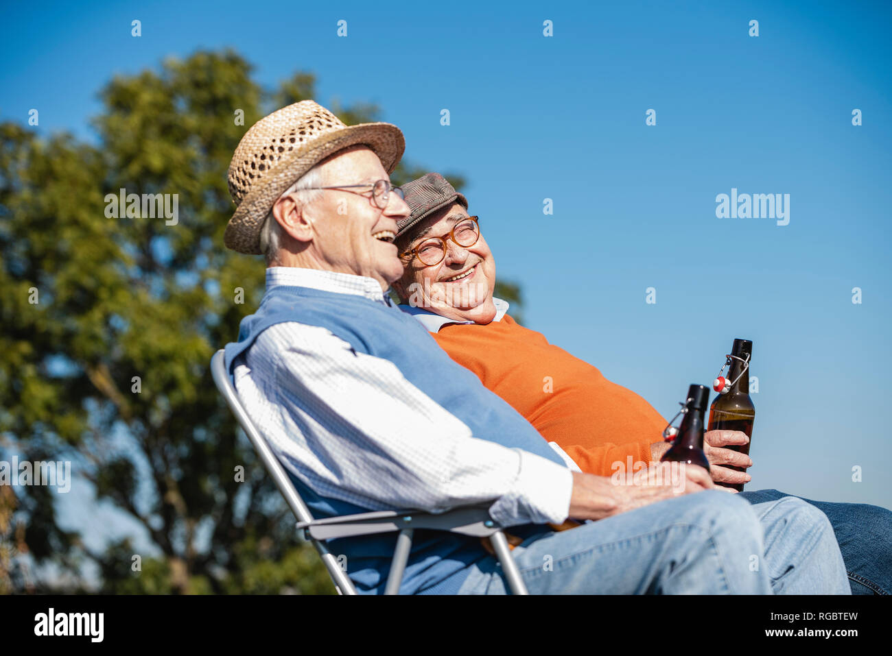 Two old friends sitting fields hi-res stock photography and images - Alamy